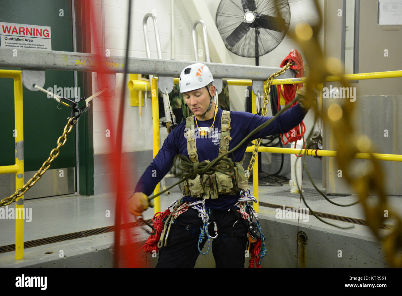 Pararescuemen from the 103rd Rescue Squadron conduct confinsed space ...