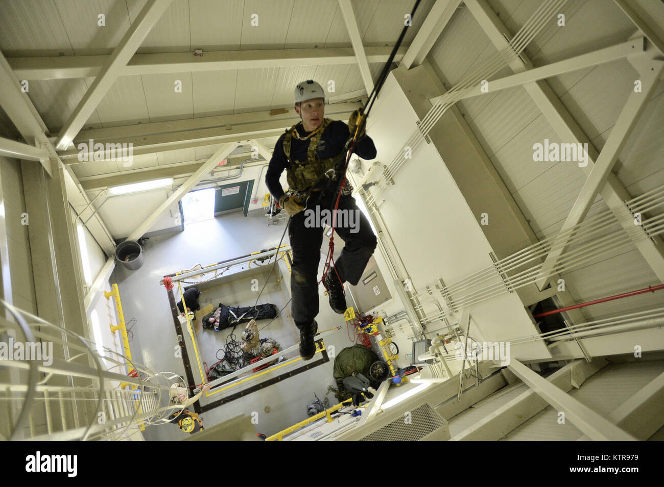 Pararescuemen from the 103rd Rescue Squadron conduct confinsed space ...