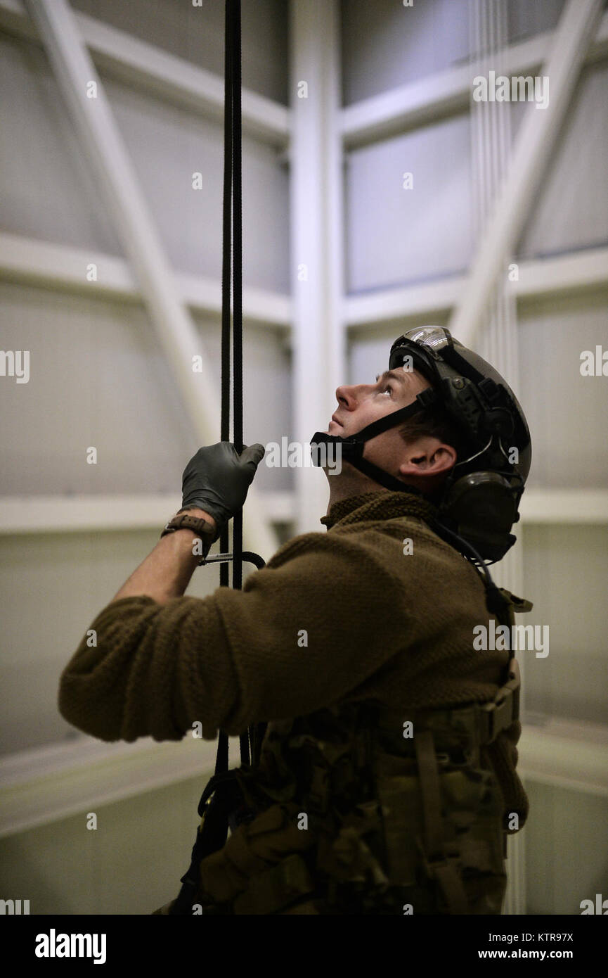 Pararescuemen from the 103rd Rescue Squadron conduct confinsed space ...