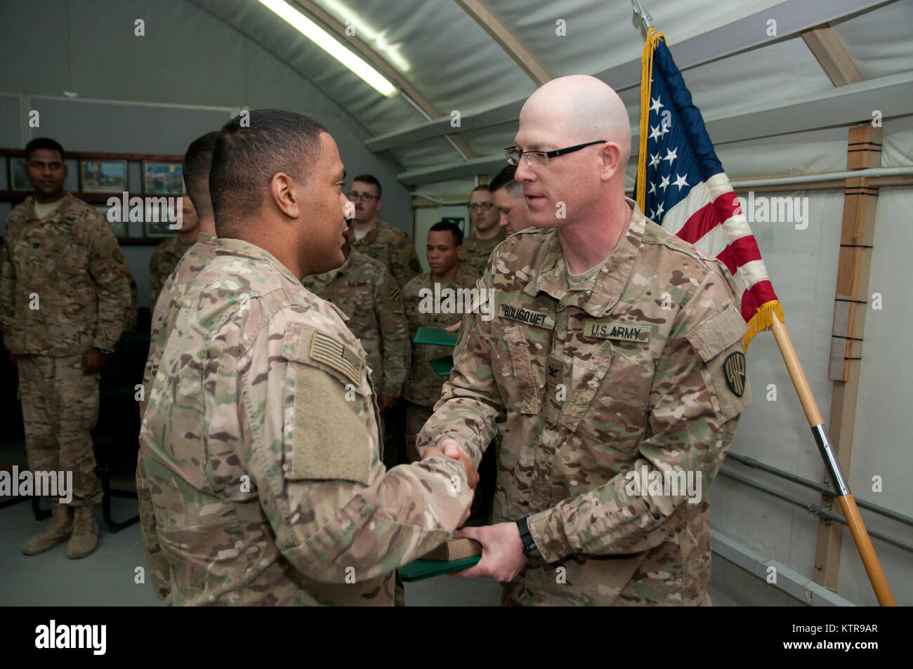 Col. Stephen Bousquet, commander of the 369th Sustainment Brigade ...