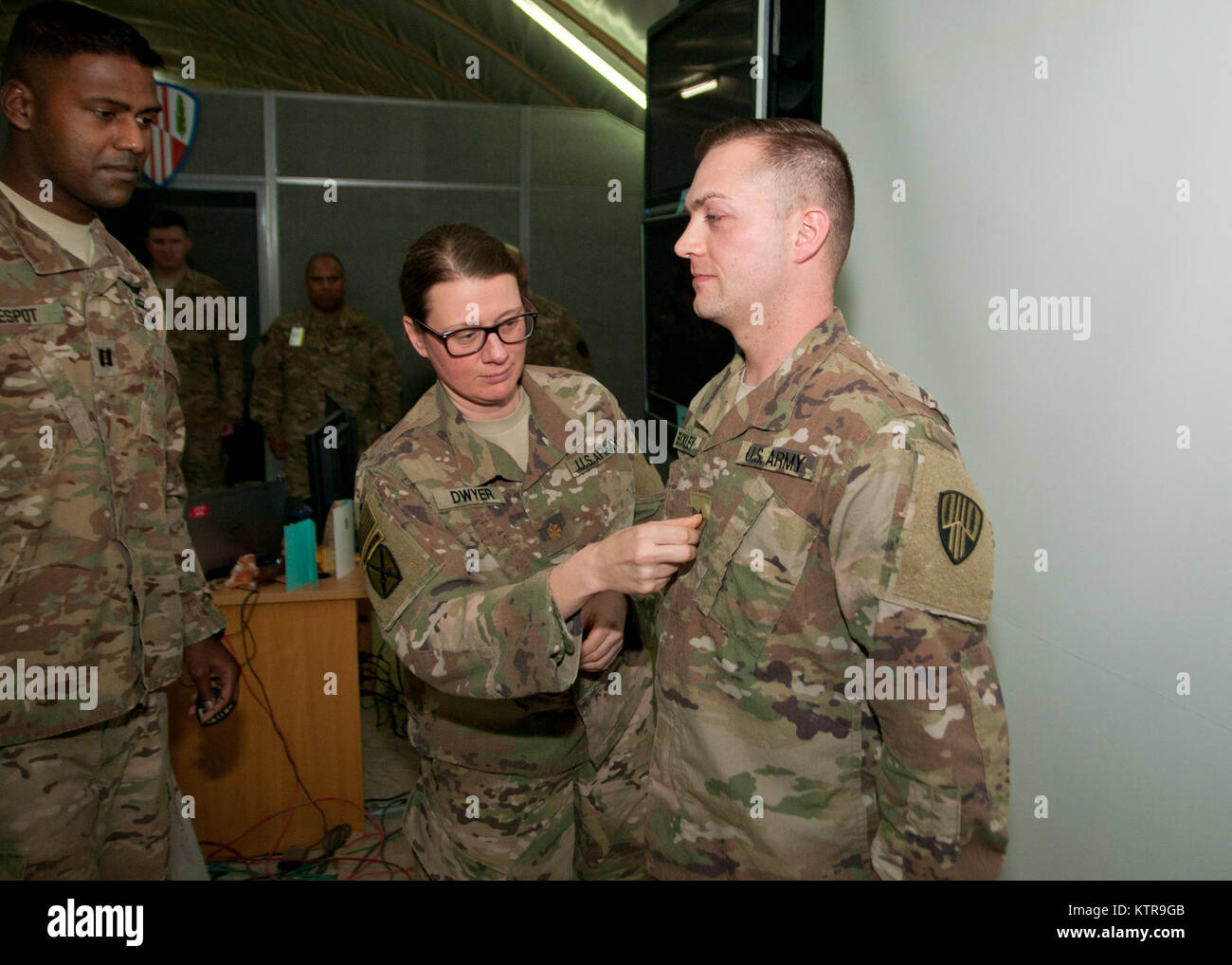 Kyle Beckley is promoted to the rank of corporal by Maj. Lisa Dwyer and ...