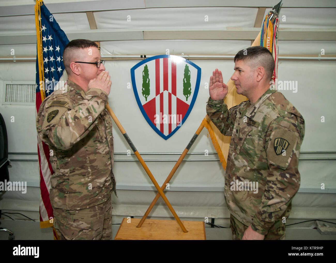 Chaplain Robert Volk is promoted to the rank of Capt. by Lt. Col. Seth ...