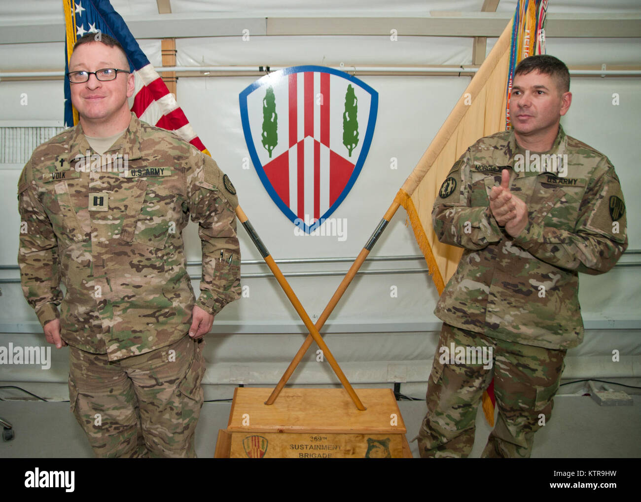 Chaplain Robert Volk is promoted to the rank of Capt. by Lt. Col. Seth ...