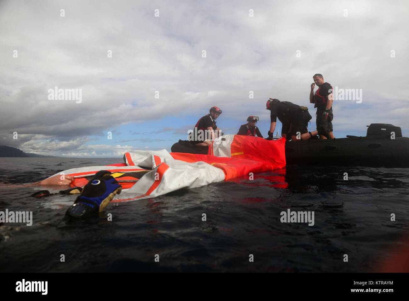 The "Front Porch" flotation device is unfolded and inflated by ...