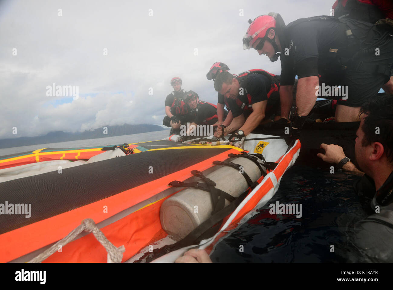 The "Front Porch" flotation device is unfolded and inflated by ...