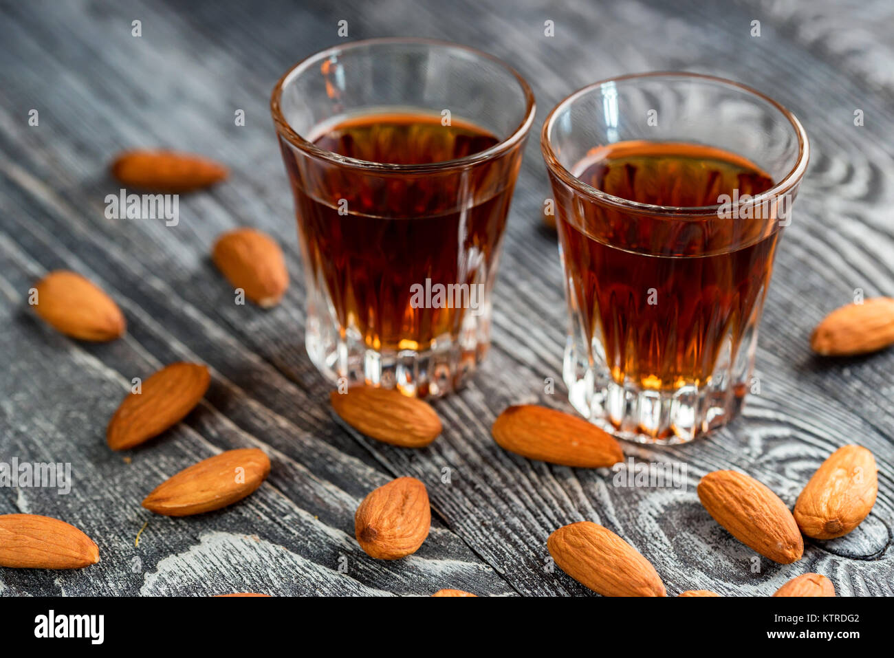 Italian amaretto liqueur with dry almonds Stock Photo - Alamy