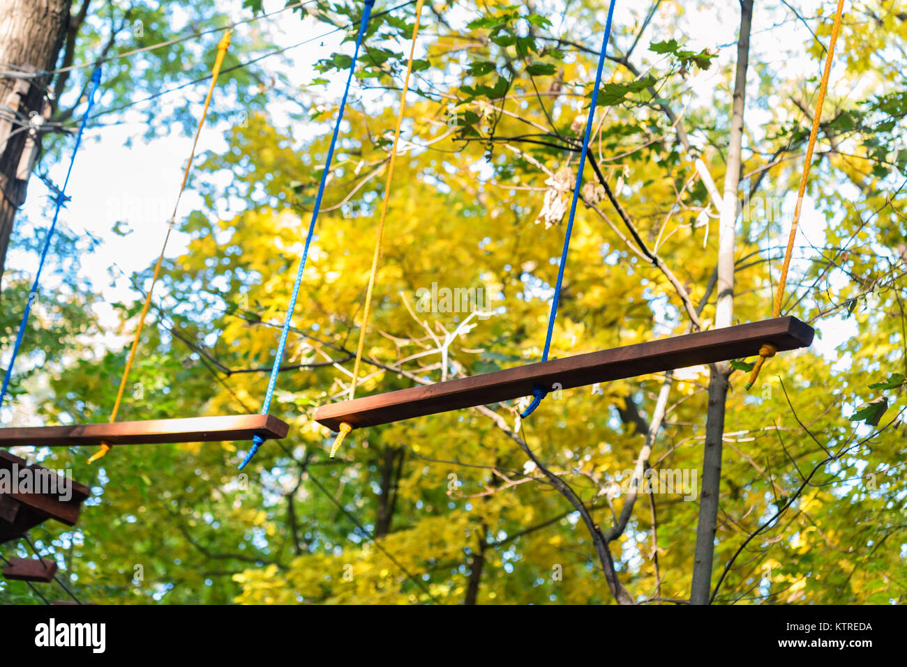 Adventure park ropes for climbing Stock Photo - Alamy