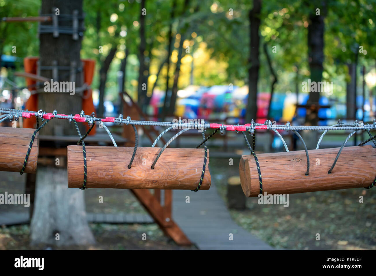 Adventure park ropes for climbing Stock Photo - Alamy