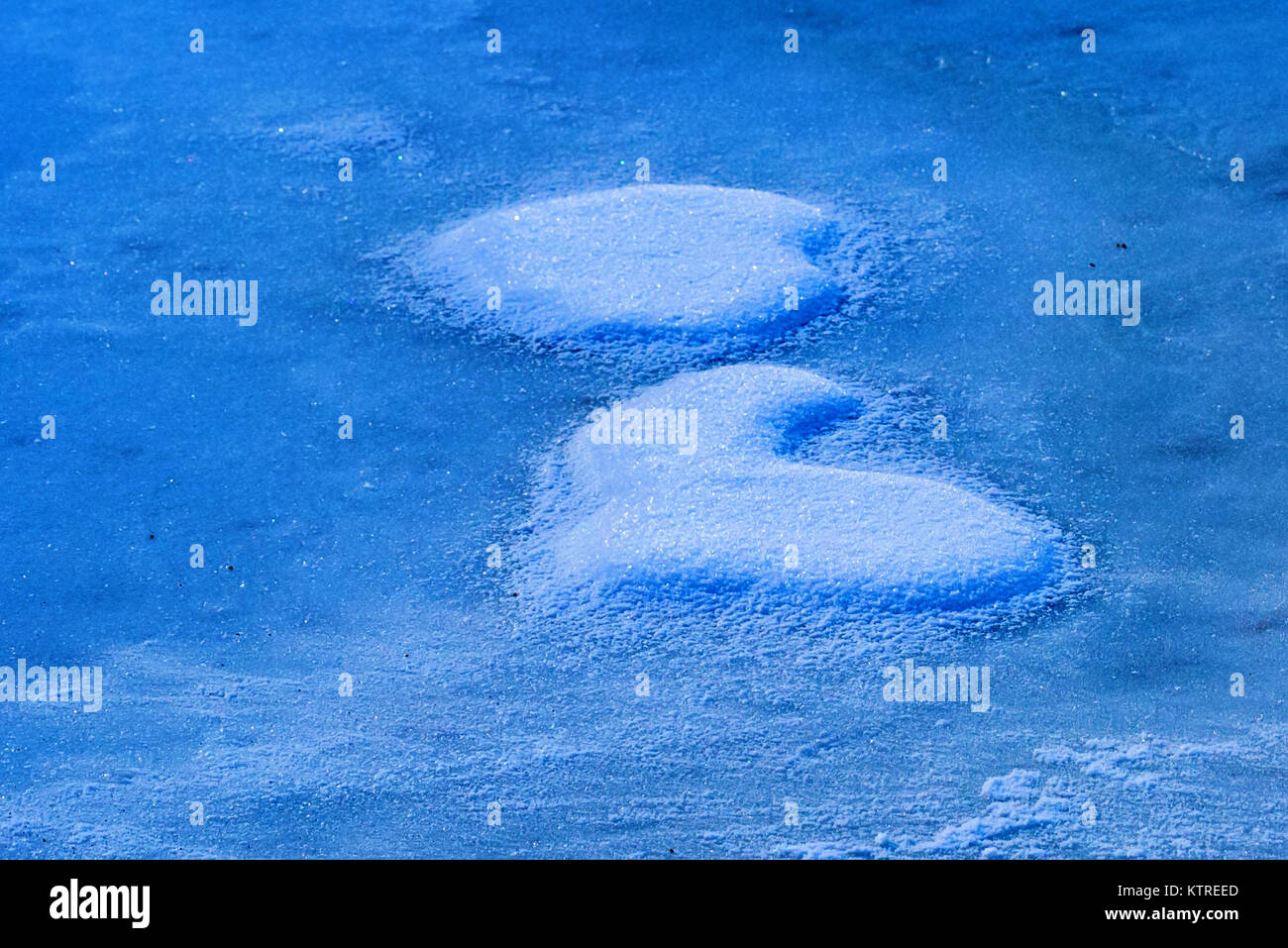 piece of snow i shape of heart Stock Photo - Alamy