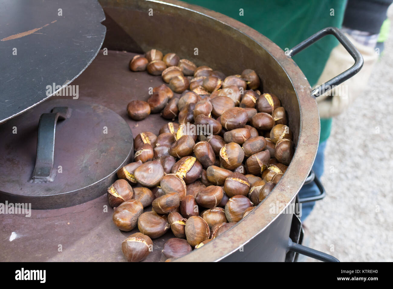 Organic Brown Chestnuts Roasting over a hot fire in winter Stock Photo ...