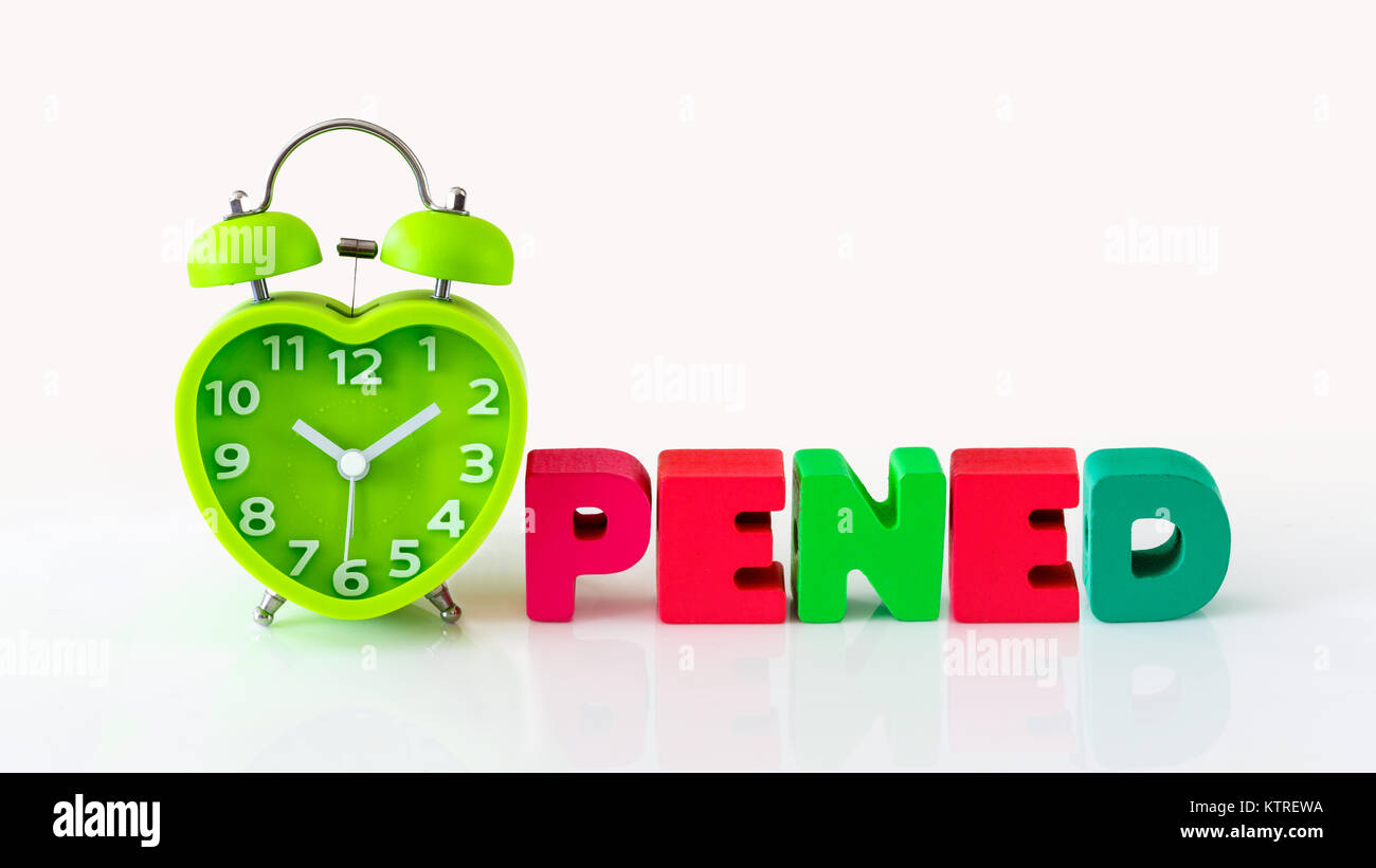 Conceptual Colorful Wooden Alphabets With Table Clock Stock Photo - Alamy