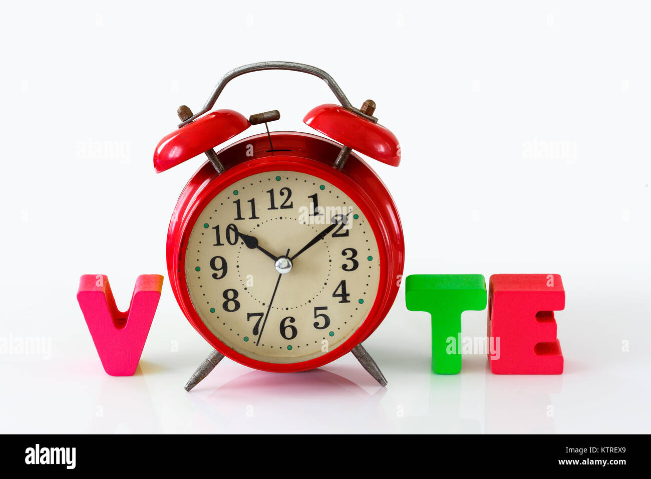 Conceptual Colorful Wooden Alphabets With Table Clock Stock Photo - Alamy