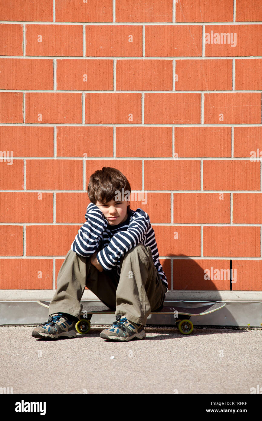 child sitting outdoor Stock Photo - Alamy