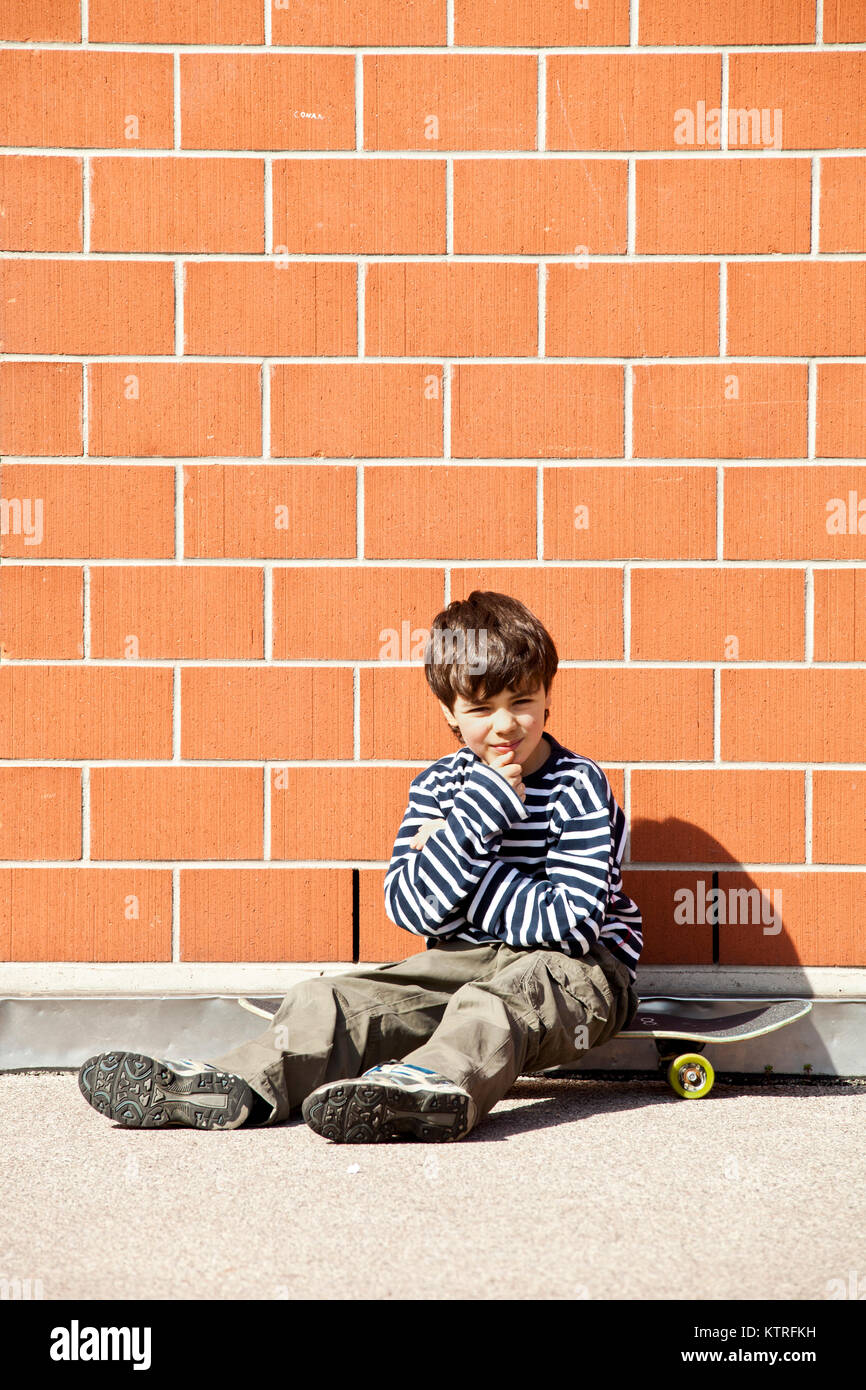child sitting outdoor Stock Photo - Alamy