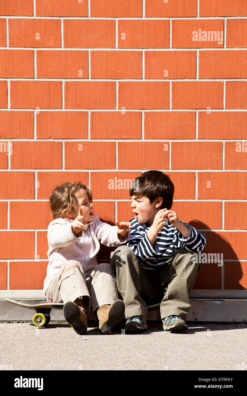 child sitting outdoor Stock Photo - Alamy