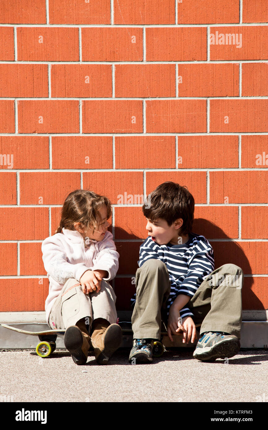 child sitting outdoor Stock Photo - Alamy