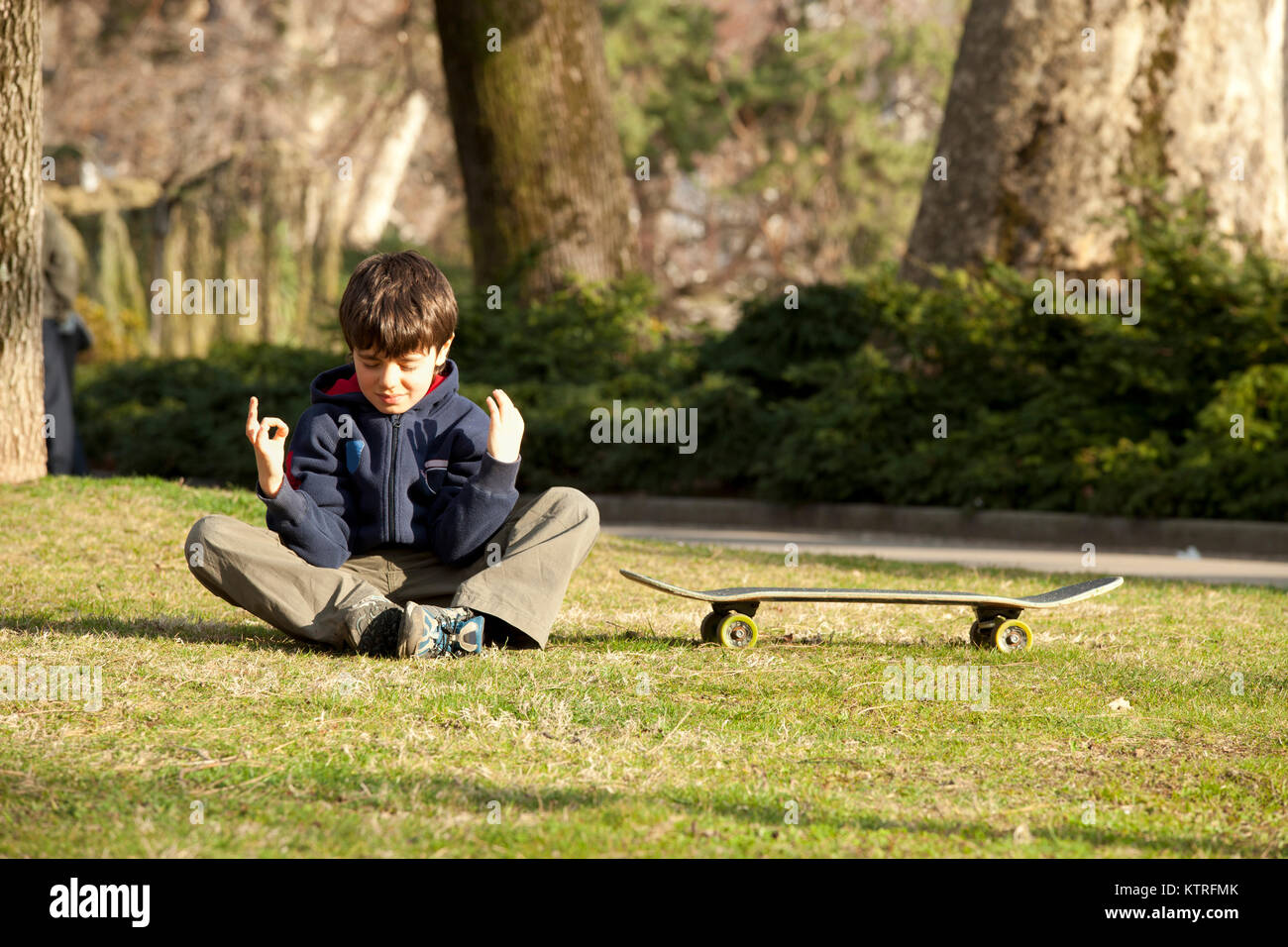 child sitting outdoor Stock Photo - Alamy