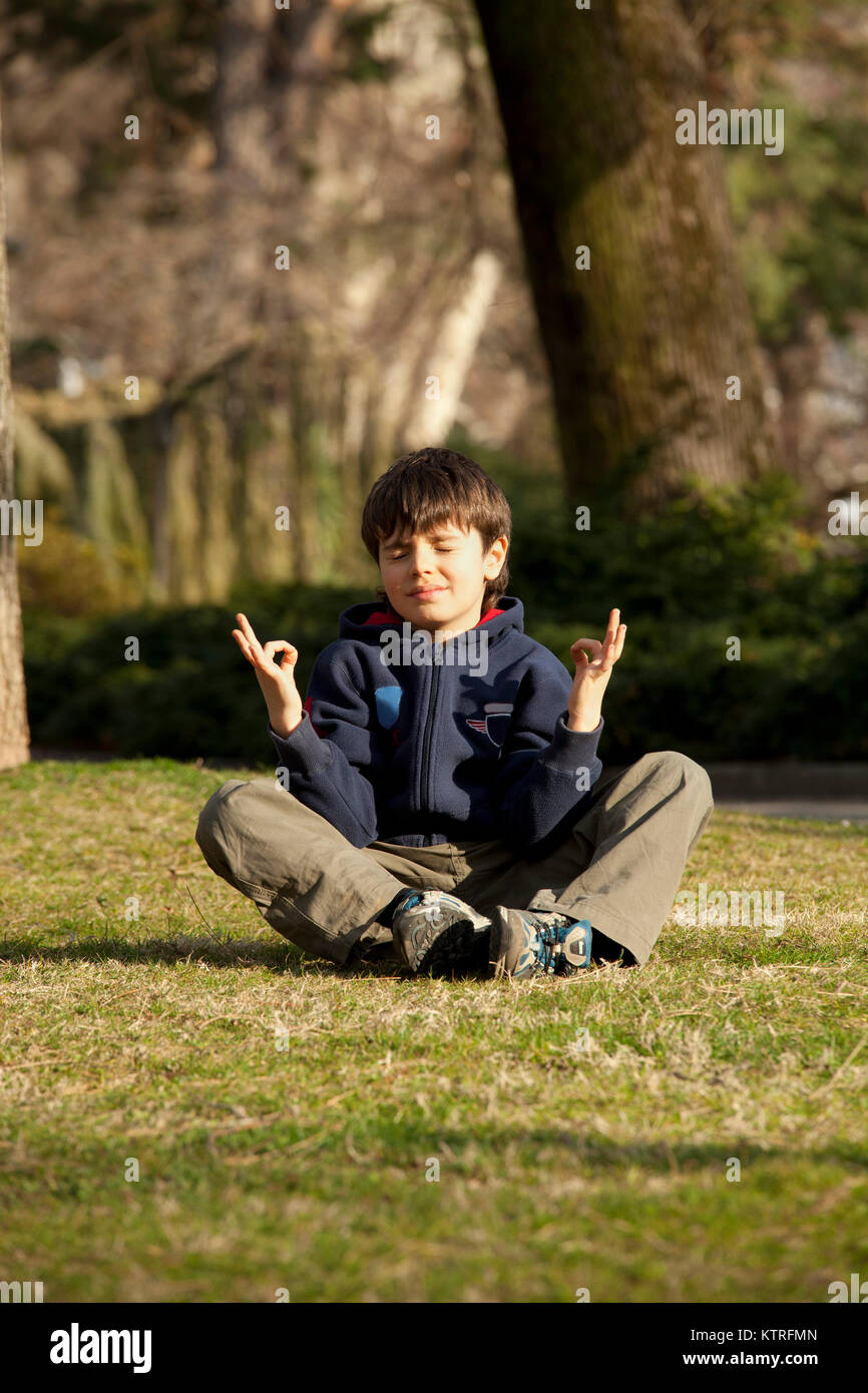 child sitting outdoor Stock Photo - Alamy