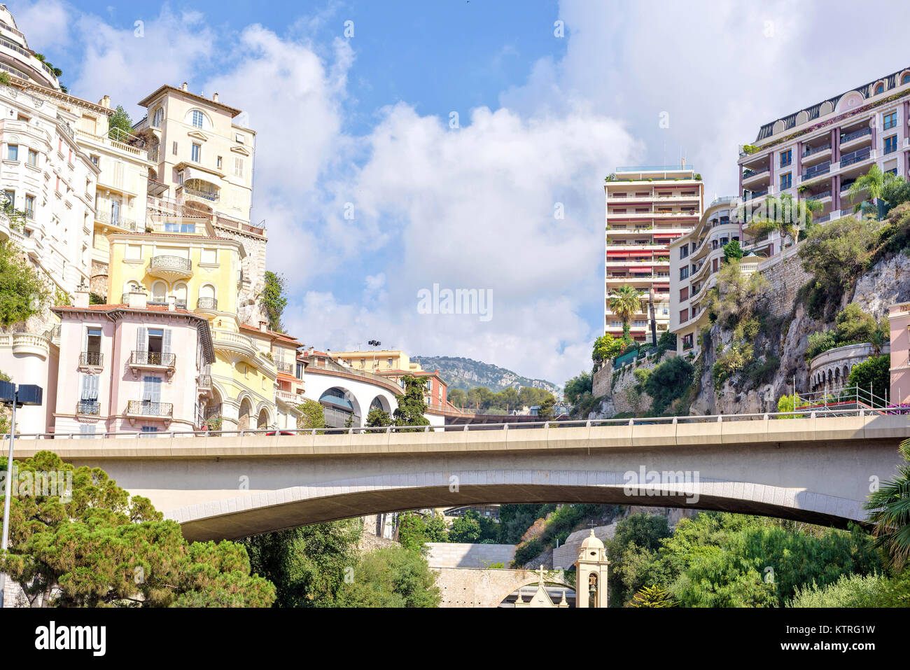Daylight sunny view to Monaco city bridge, buildings and mountains in ...