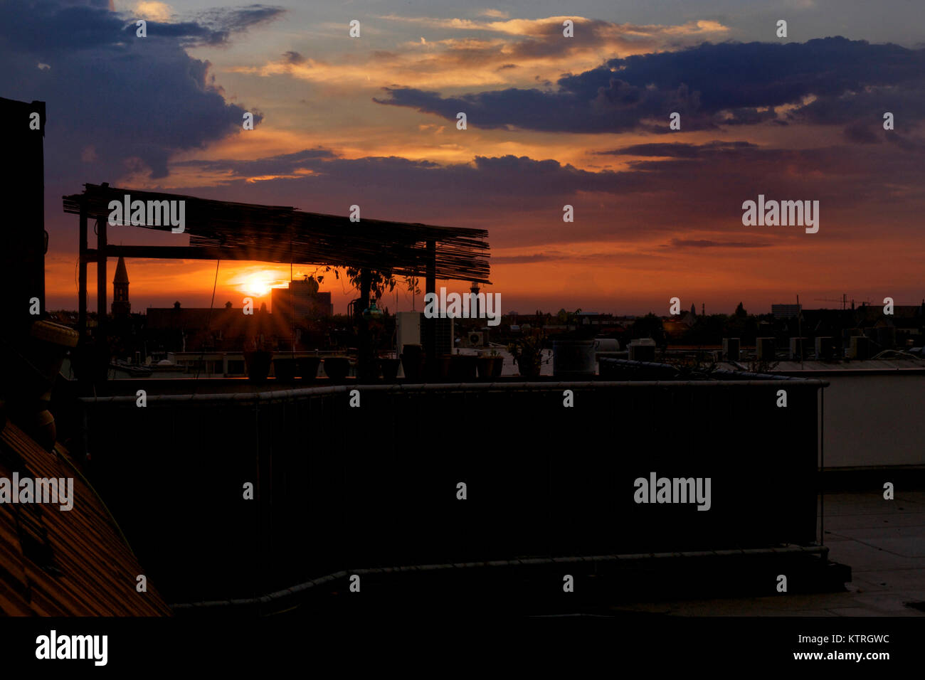 Urban sunset in the city of Cologne, Ehrenfeld, Germany. Beautiful dusk ...