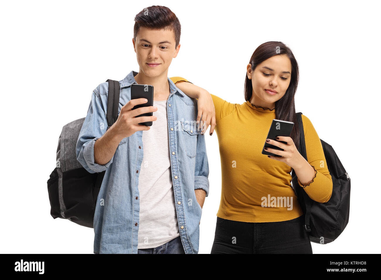 Teenage students using phones isolated on white background Stock Photo ...