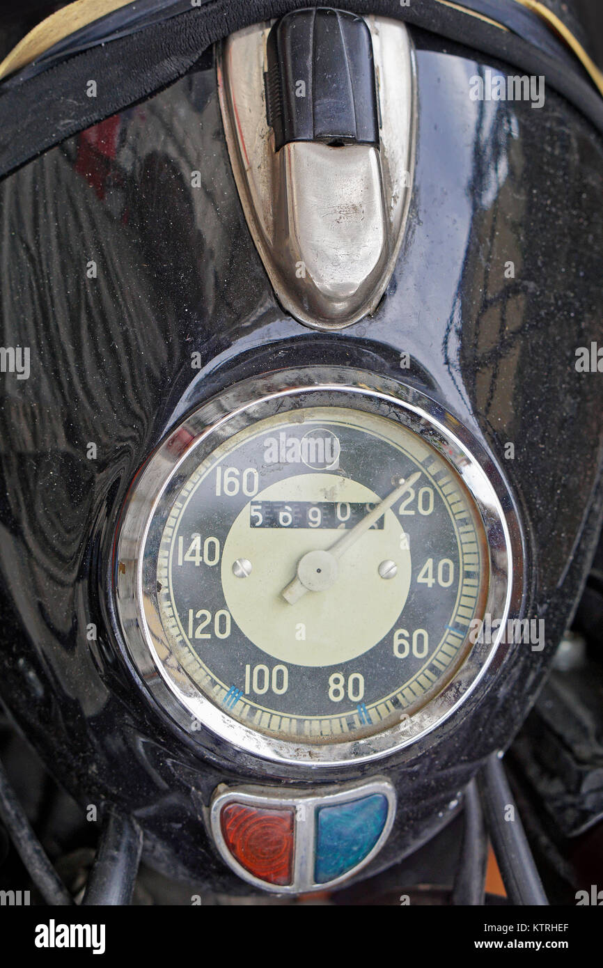 Classic vintage motorcycle speedometer at top of headlight Stock Photo ...