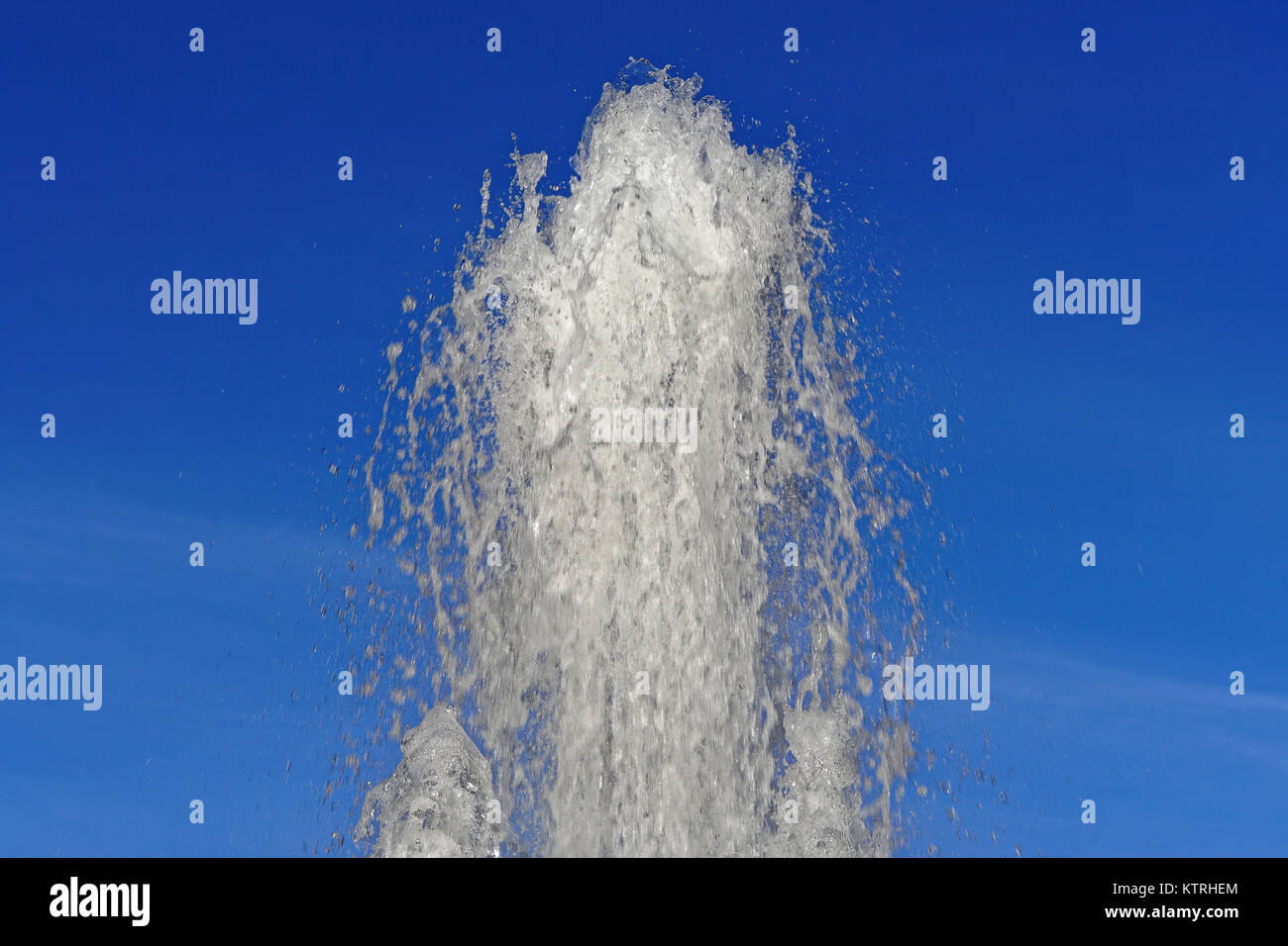Jet of water in fountain geyser Stock Photo - Alamy