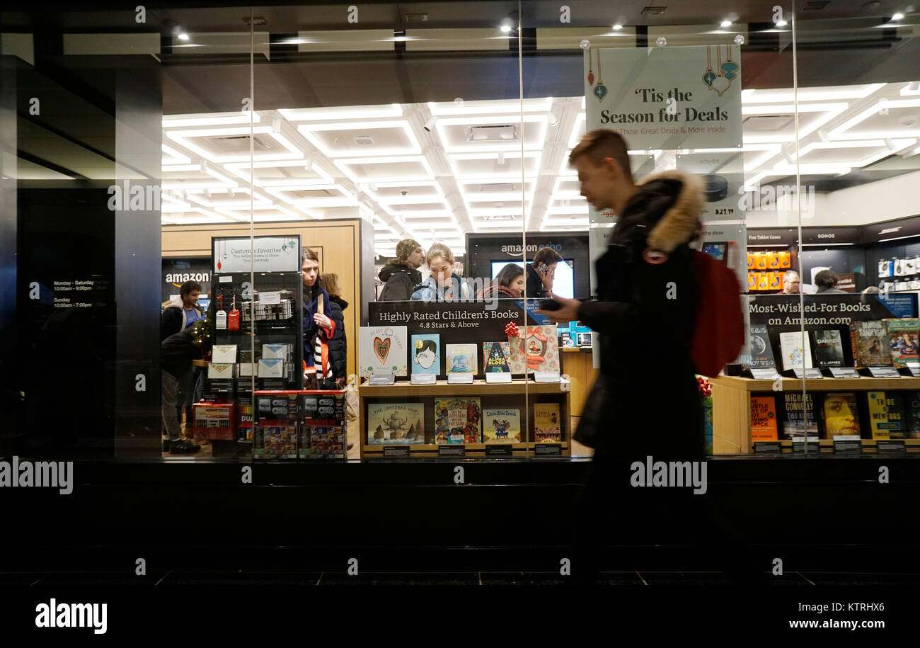 Customers shop and browse for Christmas gifts in the Amazon Books in ...