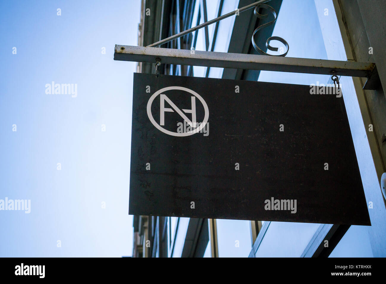 A discreet sign announces the location of the NeueHouse co-working ...