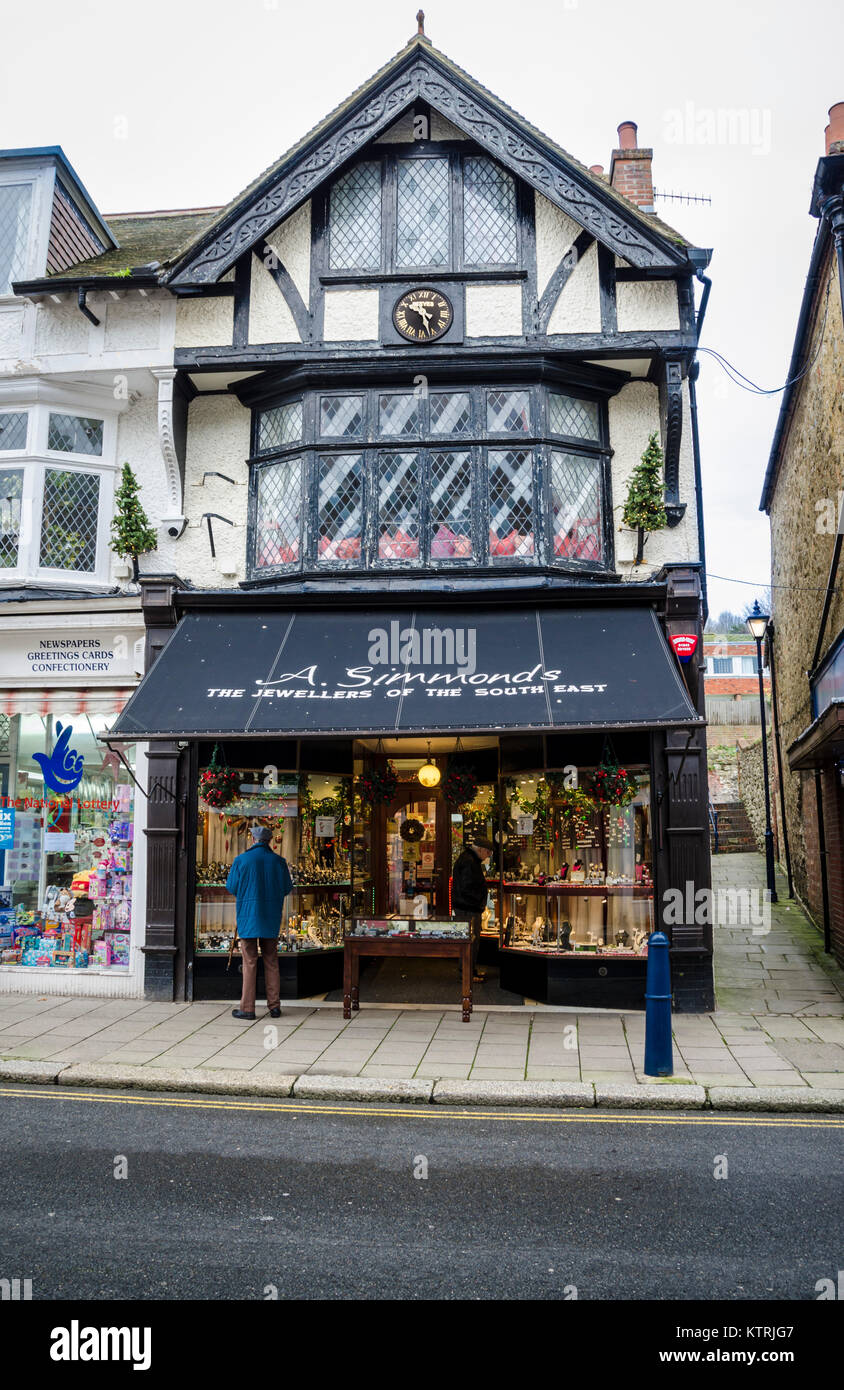 Shoppers browsing the jewellers shop in the High Street, Hythe, Kent ...