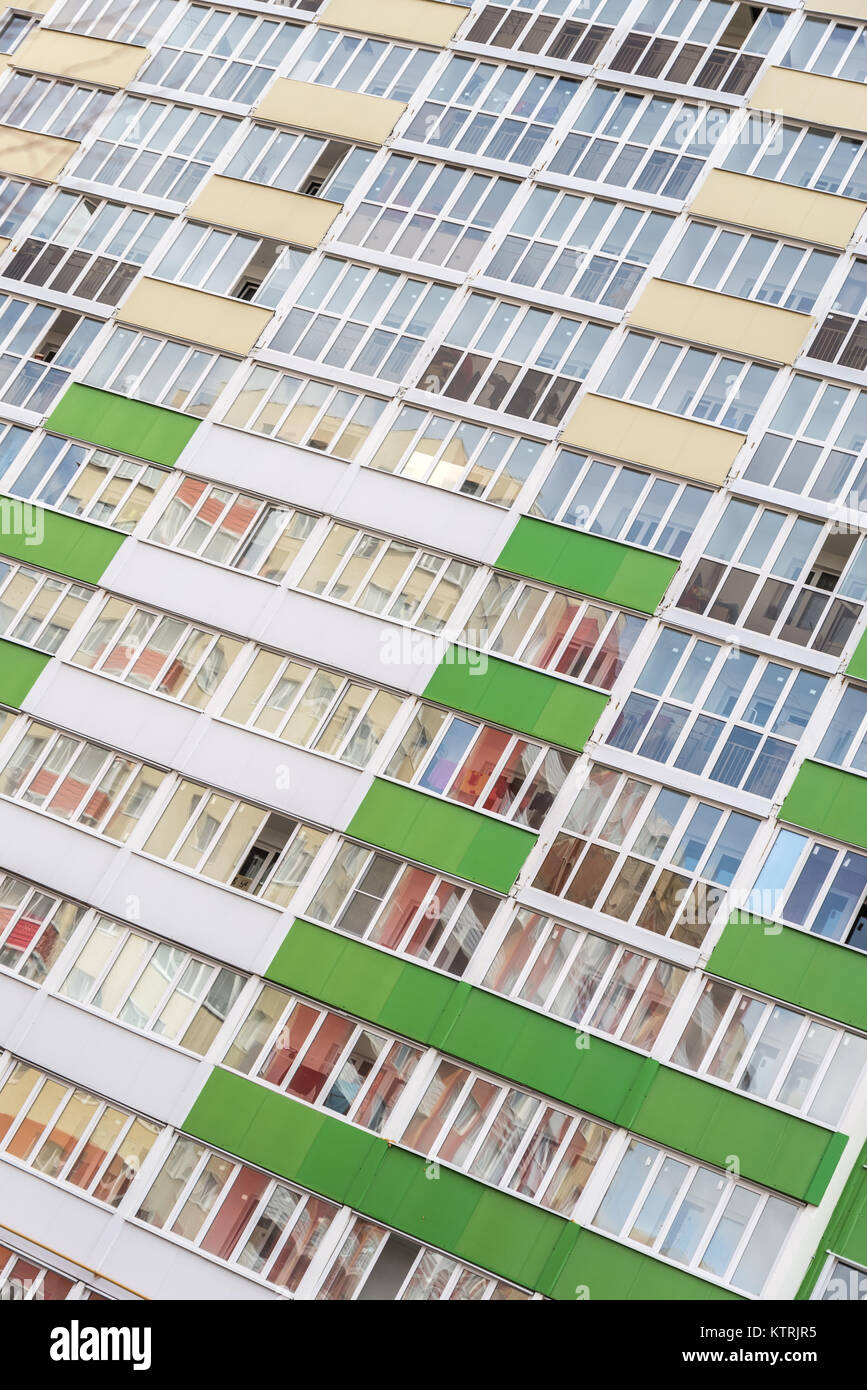 Multi-storey house with lots of windows and balconies. Background Stock ...