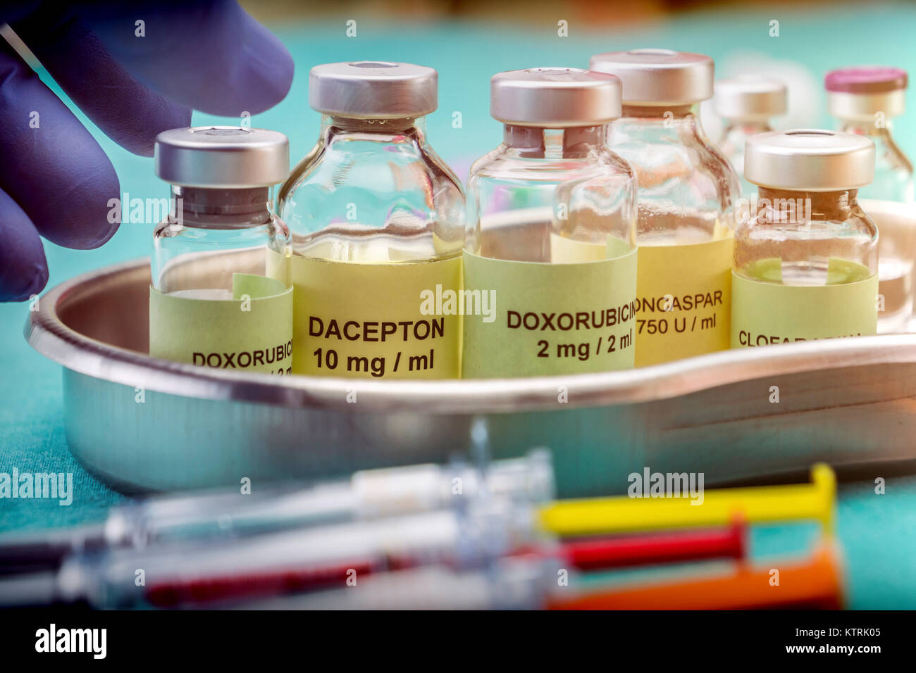 Vials of different size with medication used for neurodegenerative ...