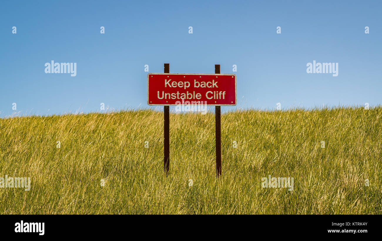 Sign: Keep back unstable cliff, seen on the South West Coast Path ...
