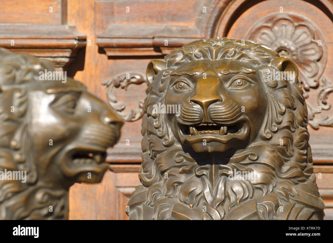 Two ferocious Lion guarding the entrance to the building Stock Photo ...