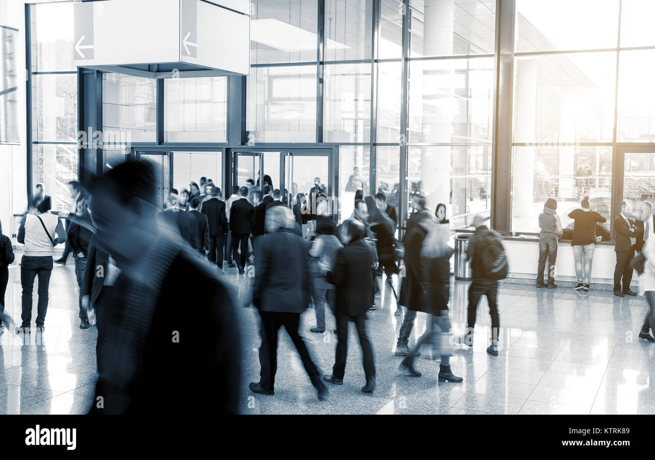 International Trade Show business people in a modern hall Stock Photo ...