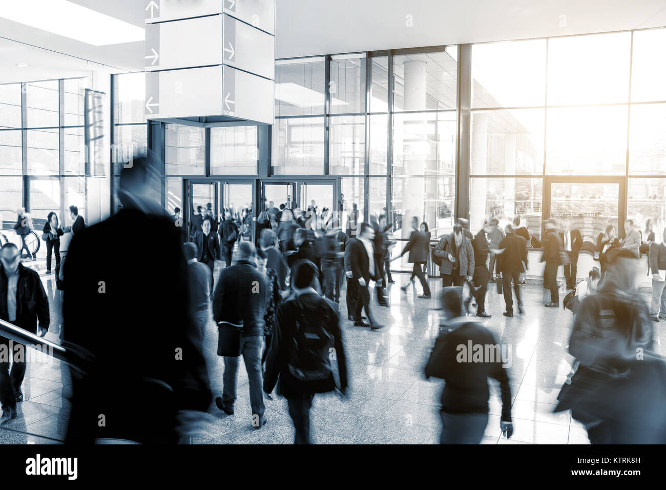 Conference Visitors rushing in a modern hall Stock Photo - Alamy