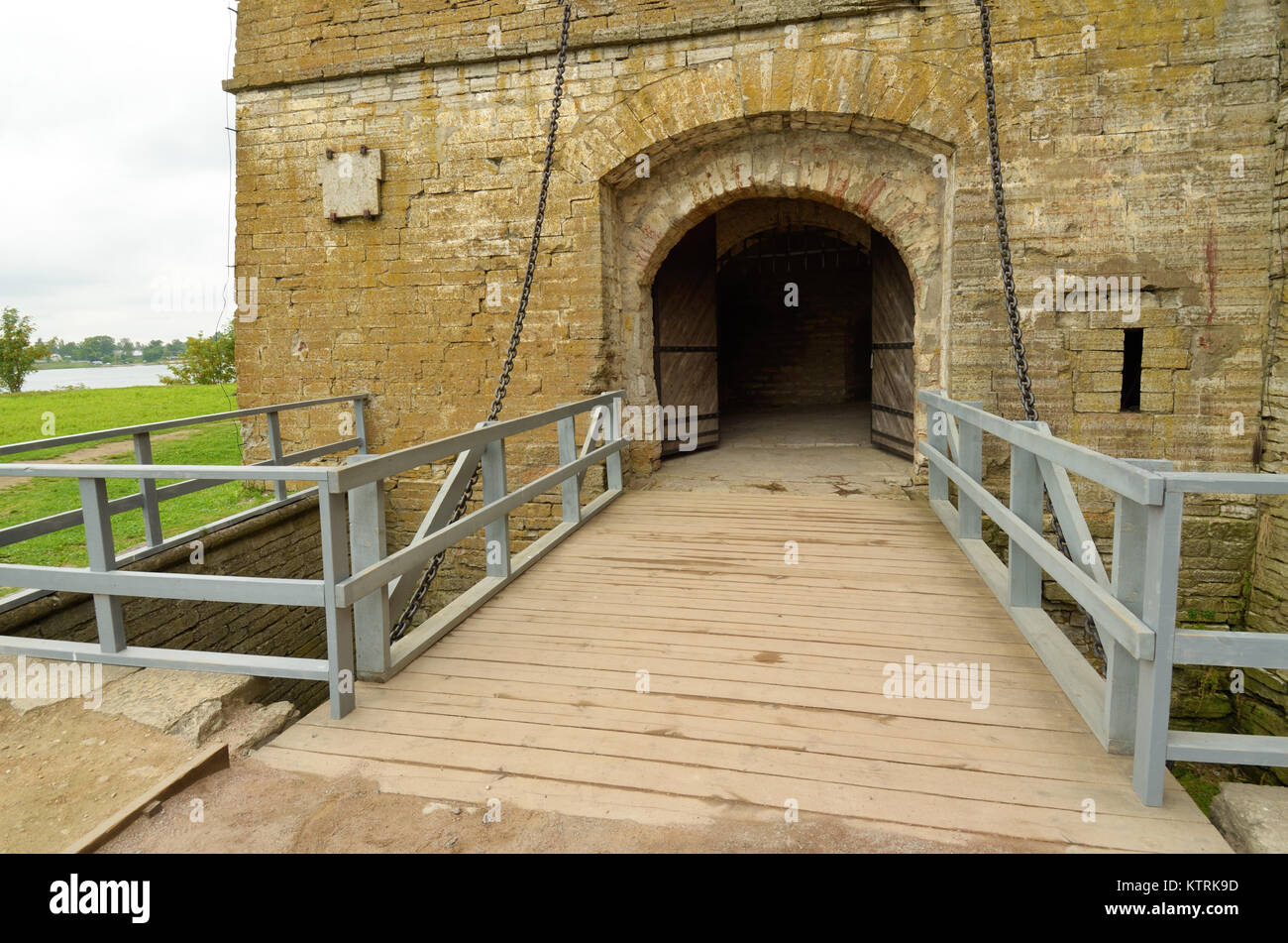 Stone gate to the fortress.Before them the bridge that rises Stock ...
