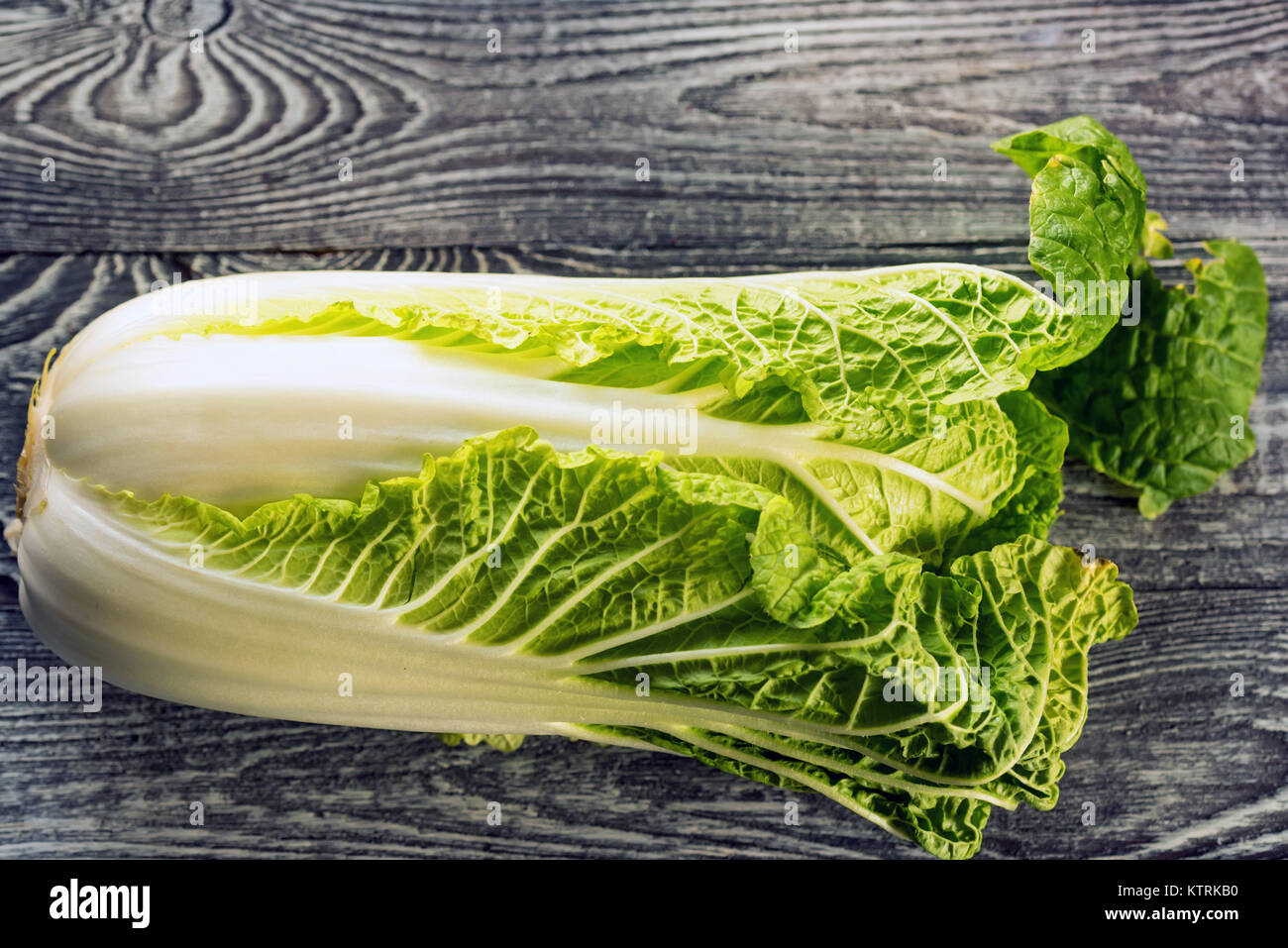 Napa or Chinese cabbage on wooden background Stock Photo - Alamy