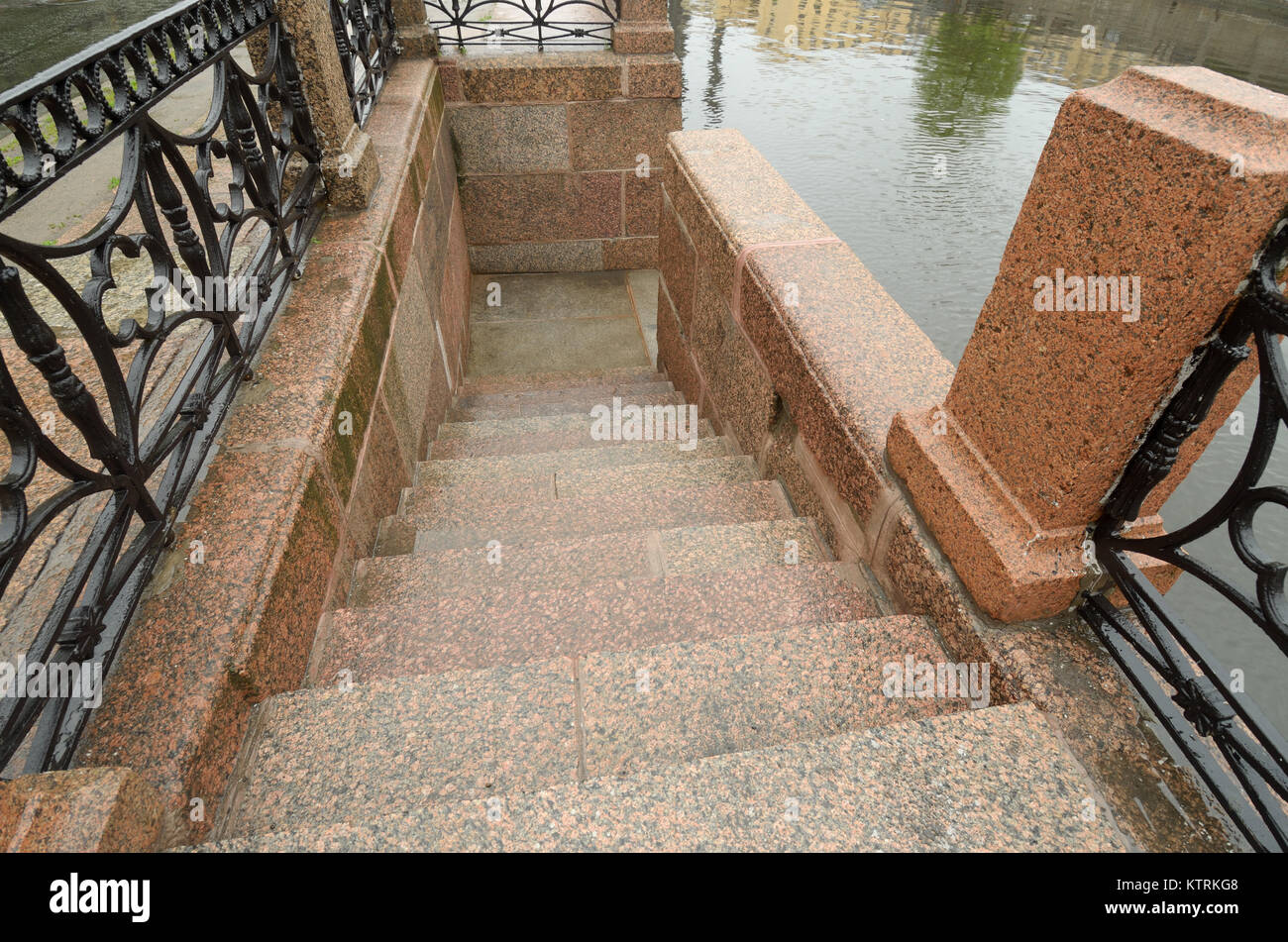 Embankment of rivers and canals lined with large granite stones Stock ...