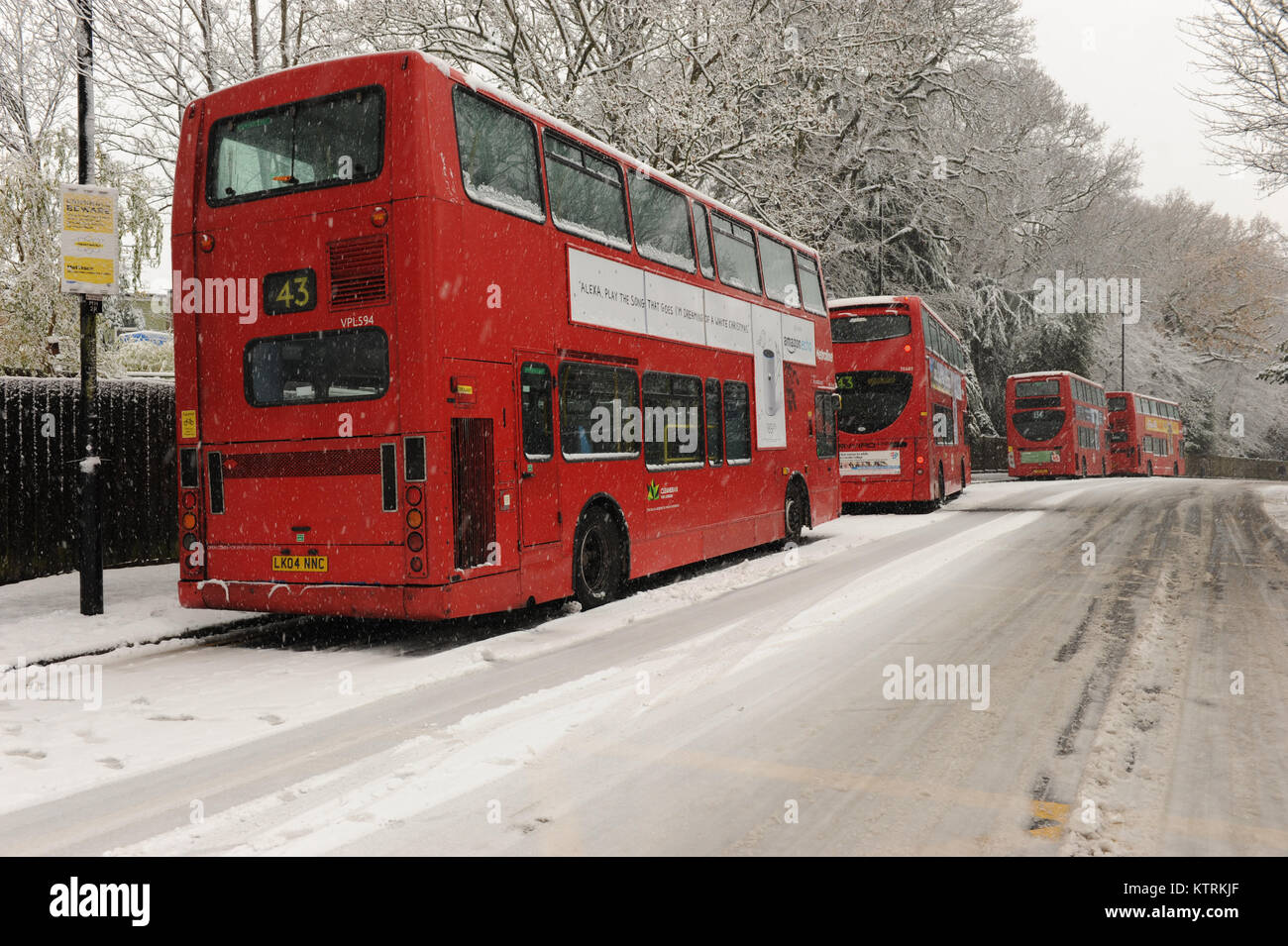 Buses in the snow hi-res stock photography and images - Alamy