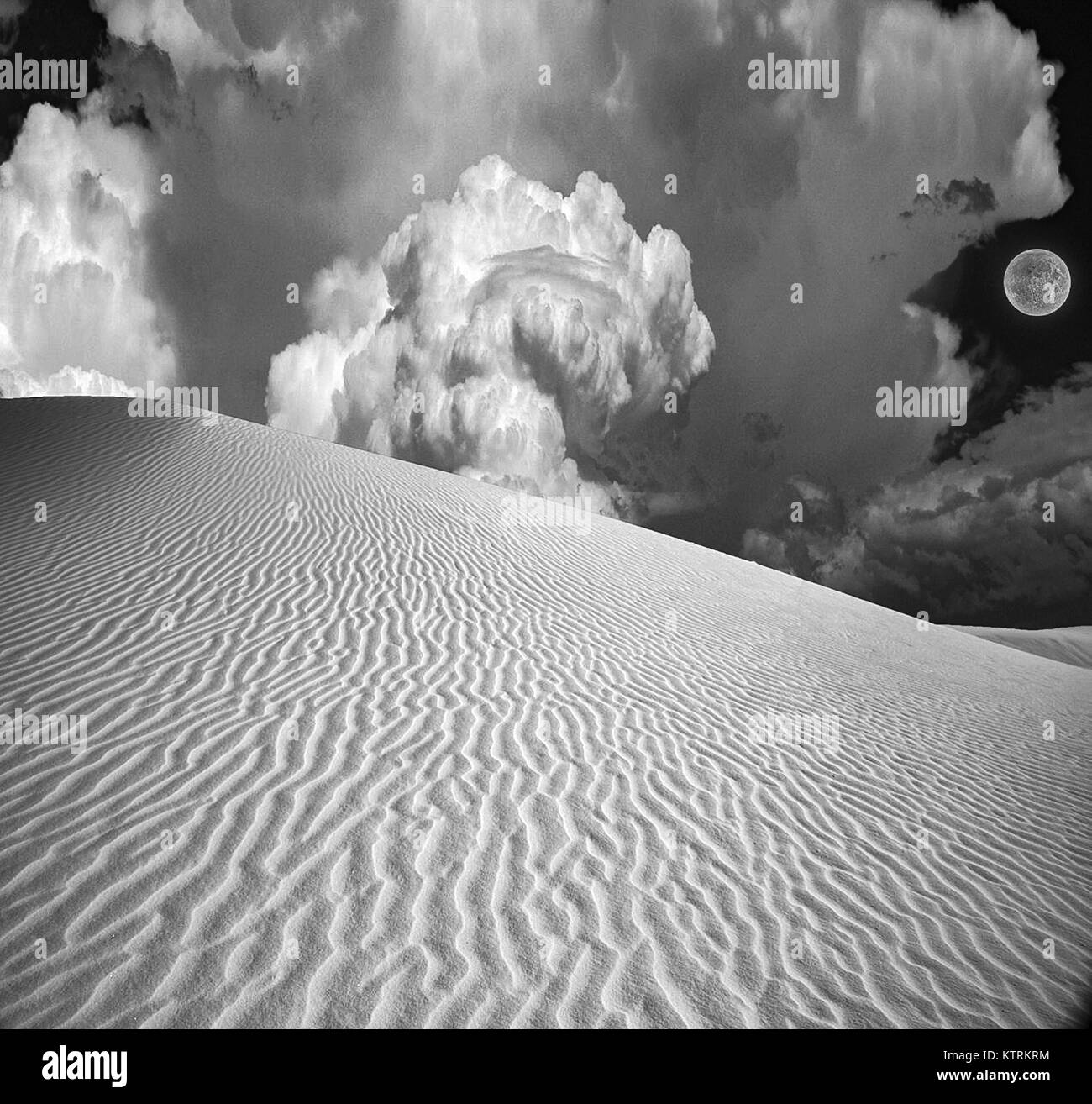 Clouds and moon over surreal desert Stock Photo - Alamy