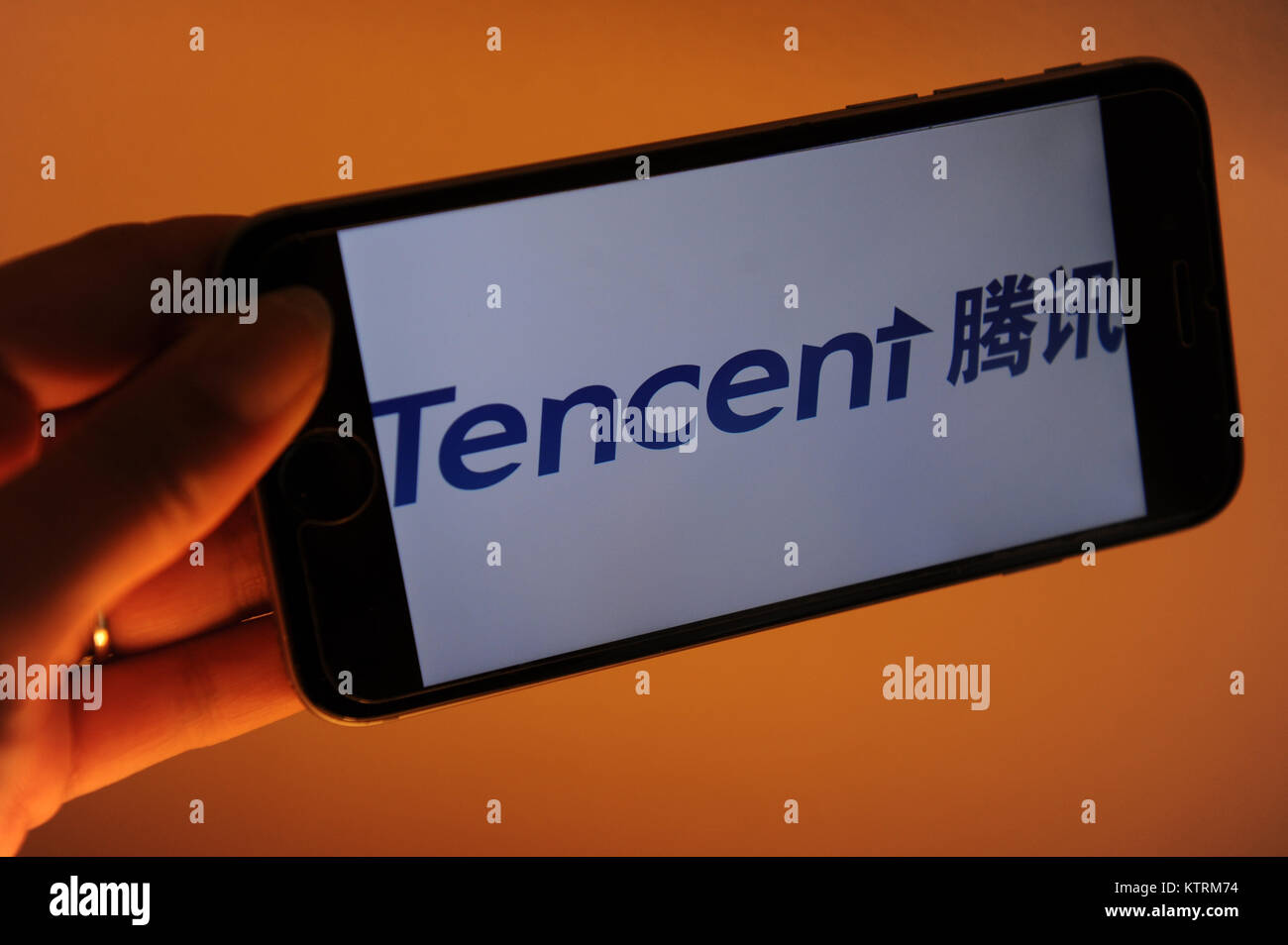 The Tencent logo on a phone Stock Photo - Alamy
