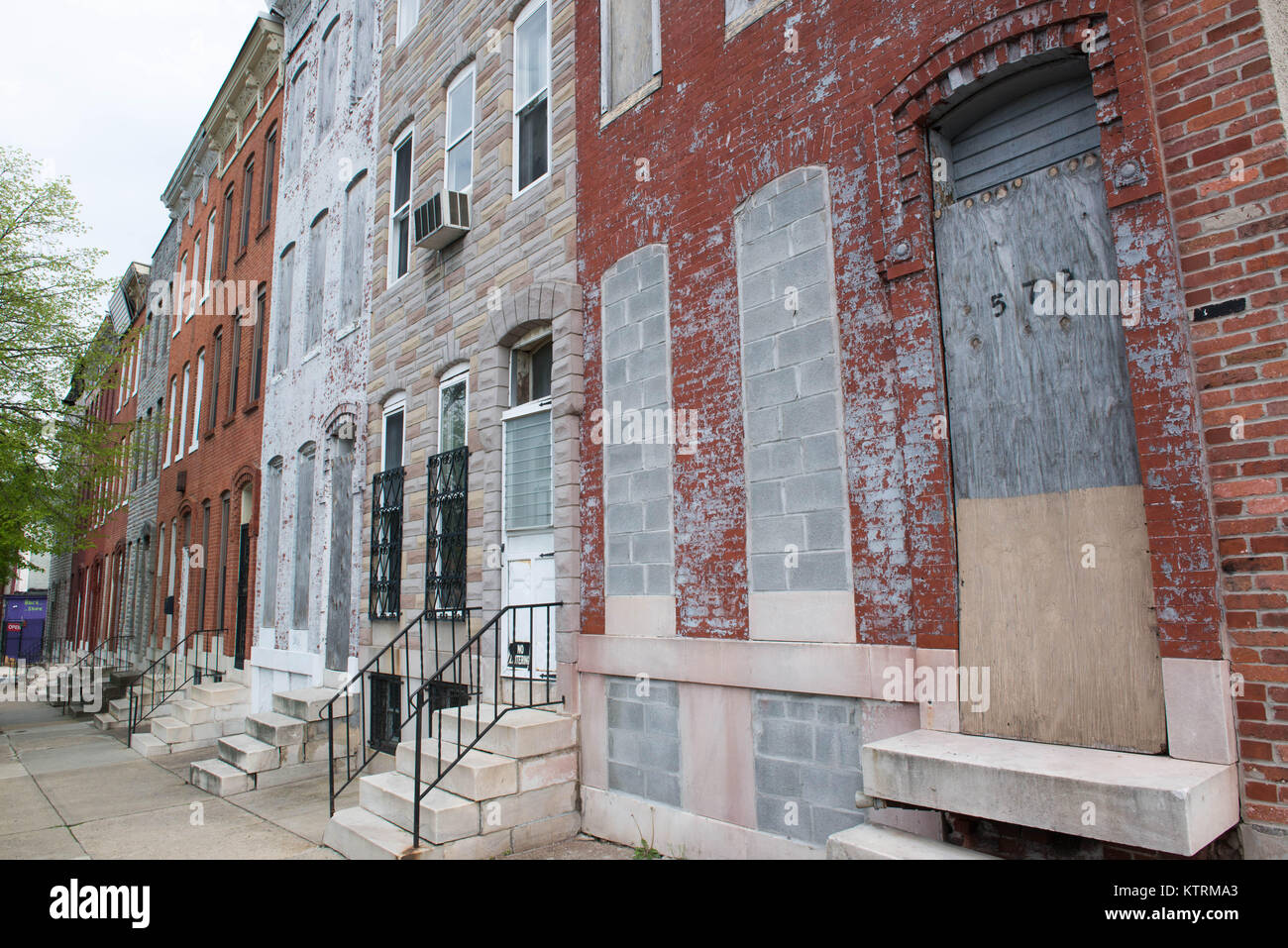 A boarded up row home on Pennsylvania Avenue in Baltimore City, MD ...