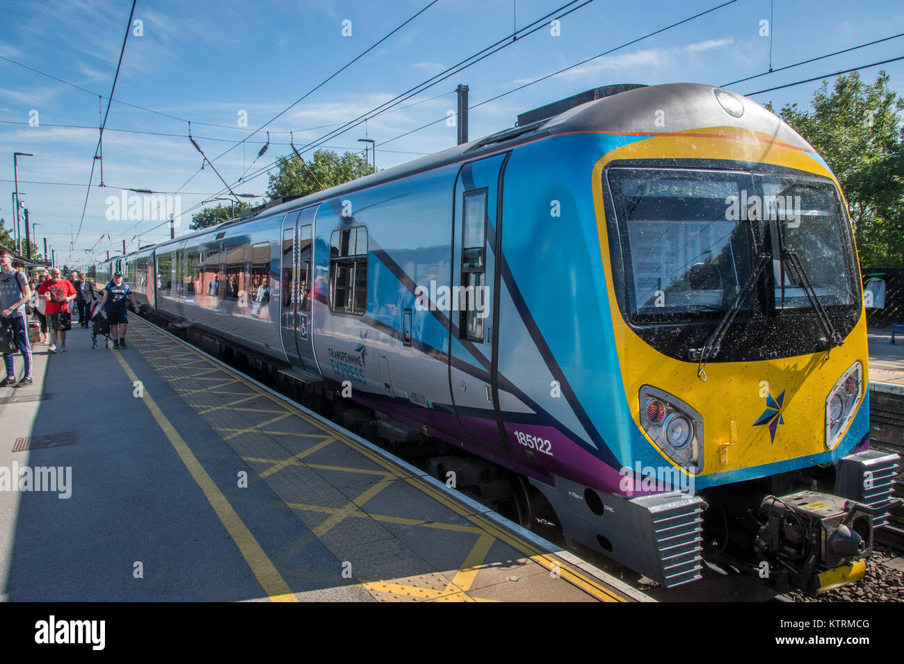 People load in and out of train arriving at Northallerton Station ...