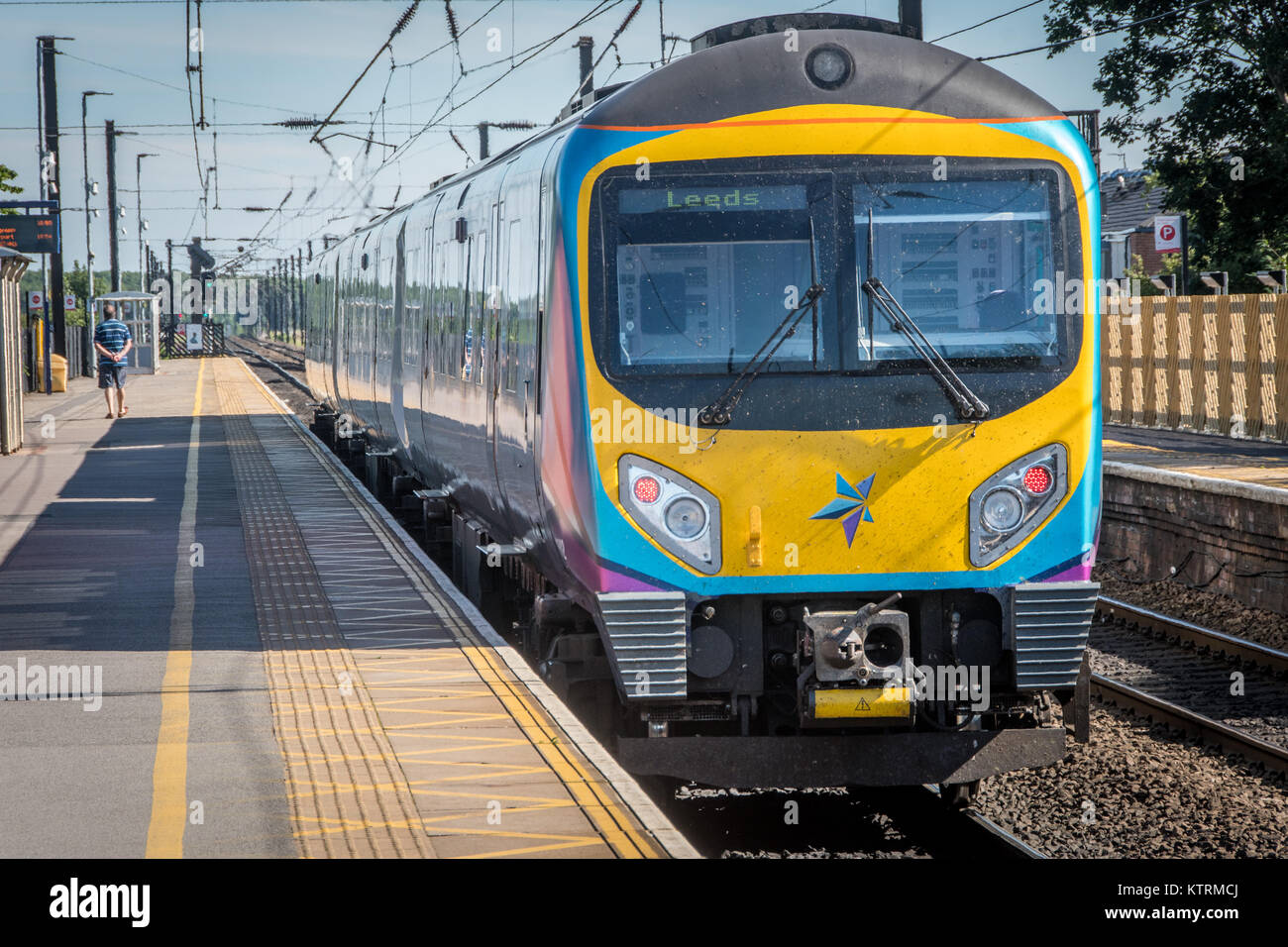 People load in and out of train arriving at Northallerton Station ...