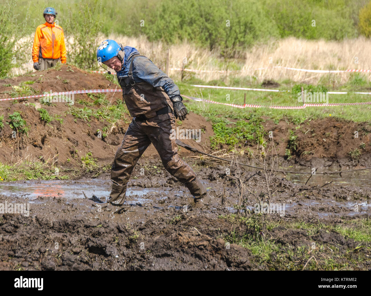 SALOVKA, RUSSIA - MAY 5, 2017: A jeep drives through a deep mud bog but ...