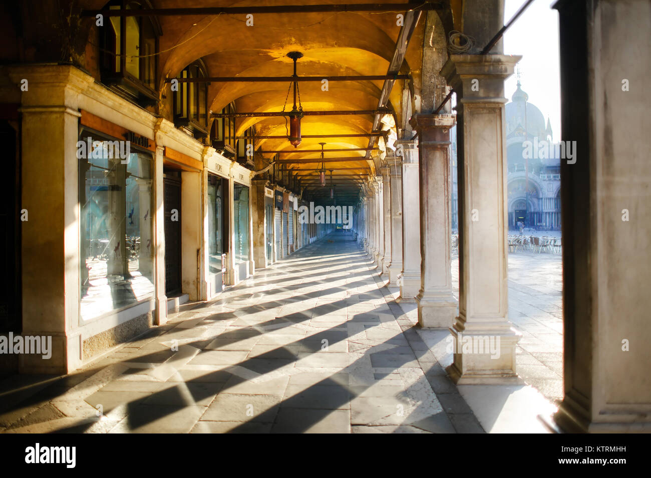 Dawn at San Marco Square, morning light and ancient columns. Venice ...