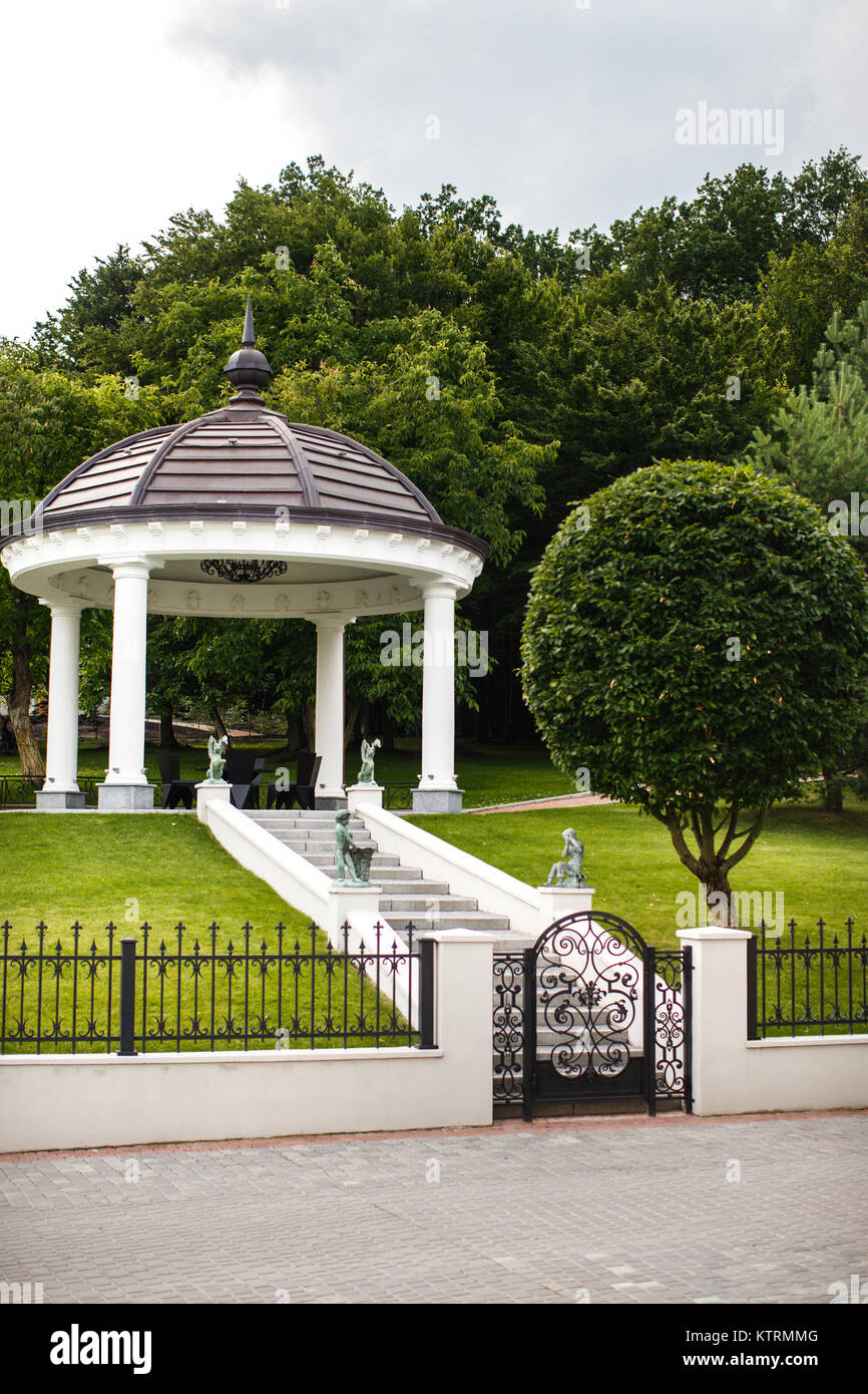 White round pavilion alcove in the park Stock Photo - Alamy