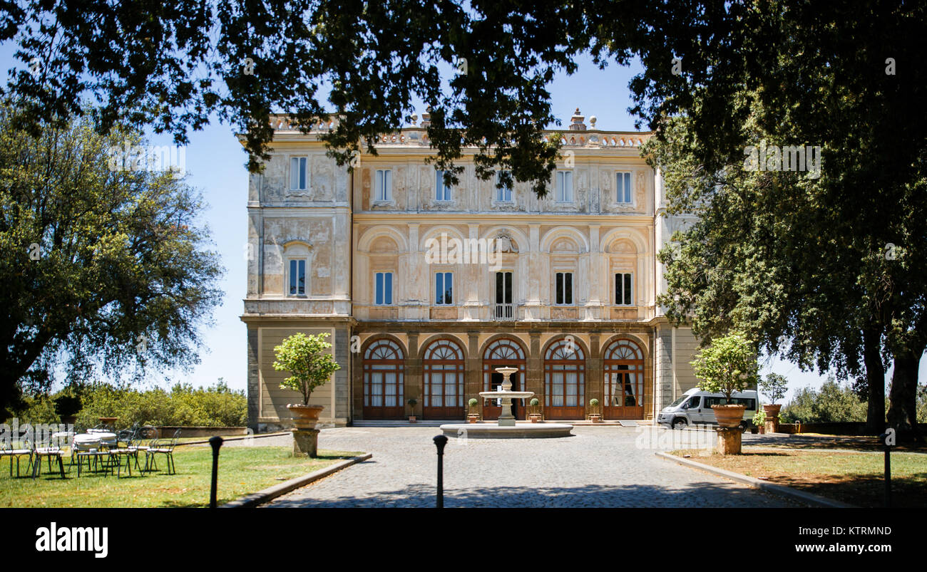 Old Italian villa and stone fountain in the trees Stock Photo - Alamy