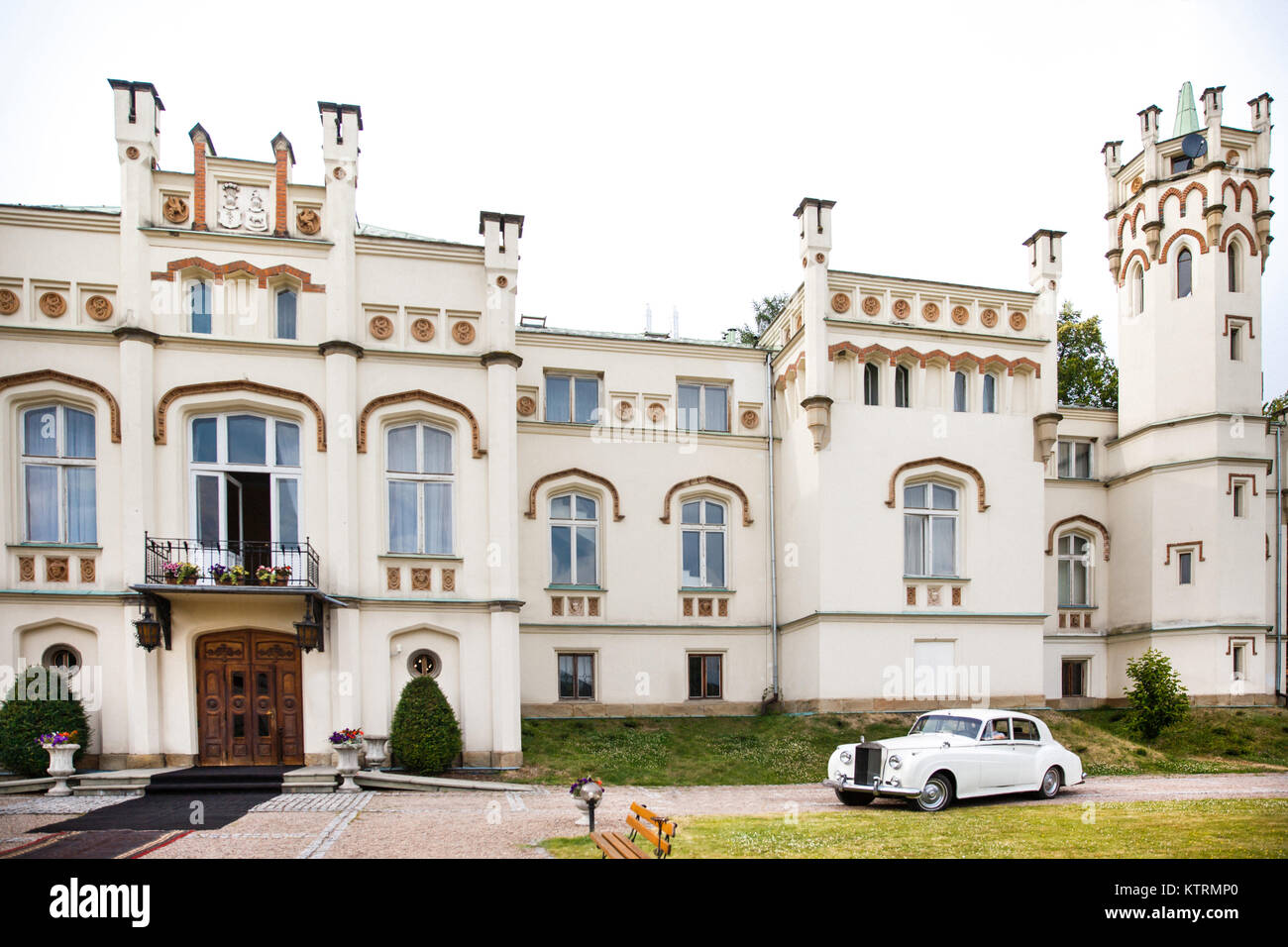 Exterior of a beautiful old house with white retro car Stock Photo - Alamy